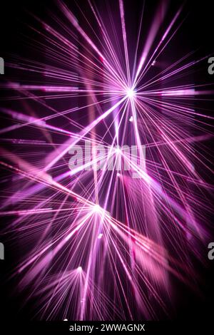 Pink laser show nightlife club stage and shining sparkling rays. Luxury ...