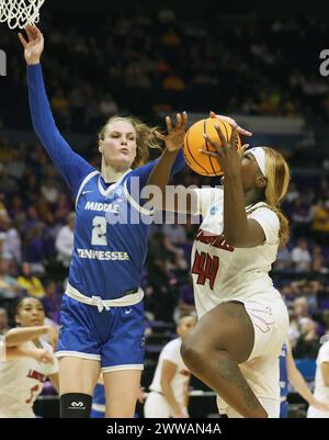Louisville forward Olivia Cochran (44) shoots around Notre Dame forward ...