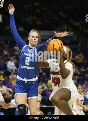 Louisville forward Olivia Cochran (44) shoots around Notre Dame forward ...