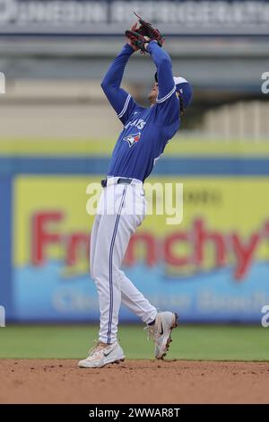 Toronto Blue Jays' Ernie Clement (22) hits a single against the ...