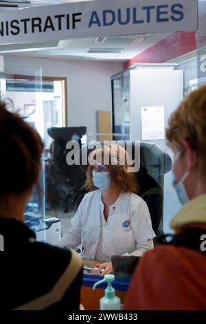 Patients at the reception of the emergency department of a university ...