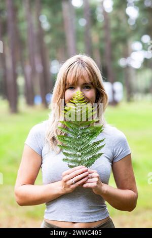 Image of lens flares over portrait of biracial young woman with afro ...