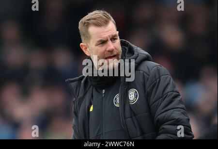 Harrogate on Saturday 23rd March 2024. Harrogate Town's Levi Sutton ...