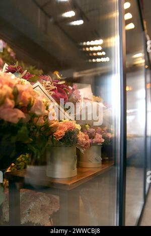 Flowers shop interior with cold storage for flowers demonstrating and ...