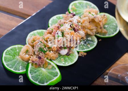 Fried calamari and sepia in a batter of tempera flour and glass of wine ...