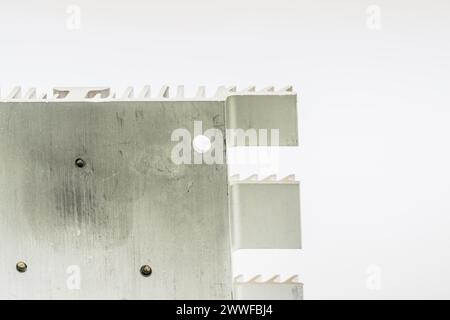 Closeup of mounting surface of rectangle aluminum heat sink on white ...