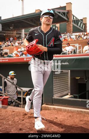 Arizona Diamondbacks' Corbin Carroll runs towards third base on his triple during the first ...