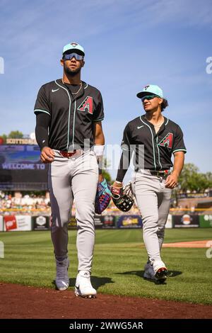 Arizona Diamondbacks' Alek Thomas, left, scores on single by Jose ...