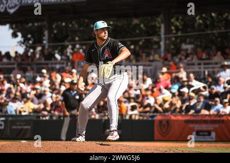Arizona Diamondbacks relief pitcher Kevin Ginkel (37) throws against ...