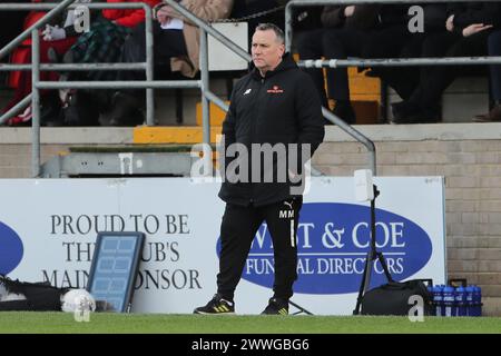 Oldham Athletic manager Micky Mellon with the trophy during the ...