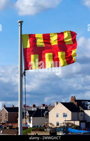 isolated Northumberland flag blowing in the wind Newbiggin by Sea ...