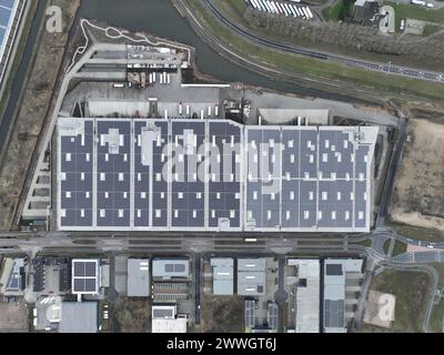 Distribution center filled with solar panels and a sustainable ...