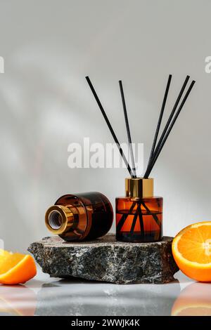 Modern Aromatherapy Diffuser With Orange Accents on a Natural Stone ...