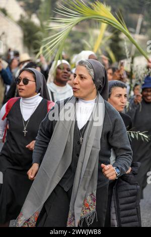Jerusalem, Israel. 24th Mars, 2024. A nun is dancing and smiling at the ...