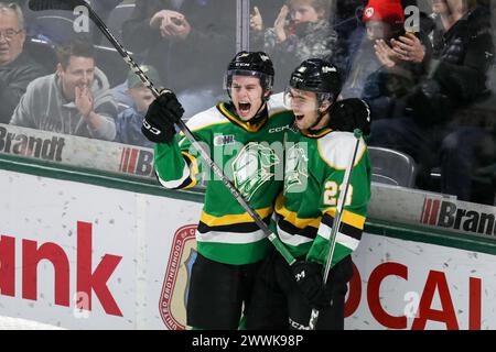 London Knights' Sam O'Reilly (23) celebrates with teammates after ...