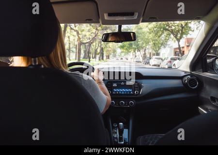 Woman driving modern car, view through windshield Stock Photo - Alamy