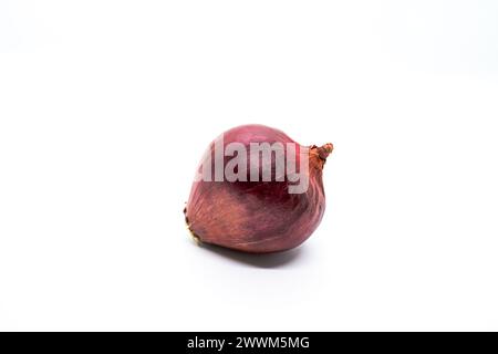 A purpleonion-whitebackground displays a fresh, raw purple onion ...