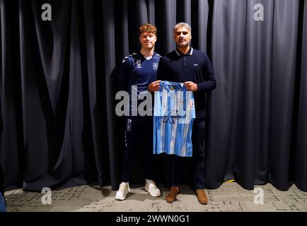 Coventry City's Victor Torp (left) warming up before the Sky Bet ...