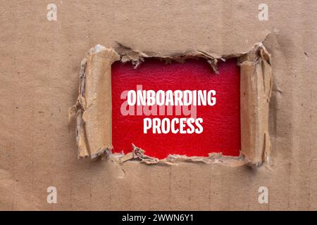 Onboarding process words written on wooden blocks with blue background ...