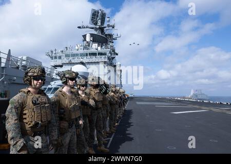 Royal Navy Merlin Commando Helicopter lifting start guns into position ...