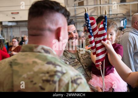 A member of Task Force Tomahawk reunites with their family during a ...