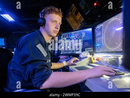 PHILIPPINE SEA (Feb. 1, 2024) Seaman Recruit Elijah Mawuli stands watch ...