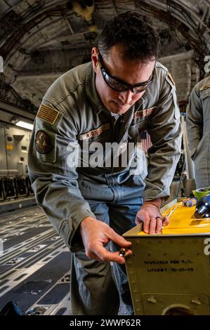 A 46-man life raft rigid container sits onboard a C-17 Globemaster III ...