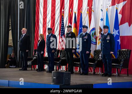 Members of the official party stand at attention during the U.S ...