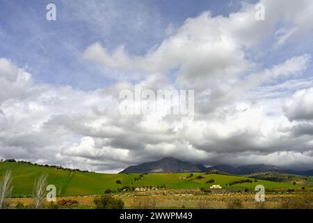 Countryside with hills and agricultural fields by the A-356 road ...