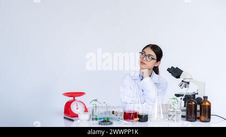 A female scientist demonstrating a pose while using her intellect Stock ...