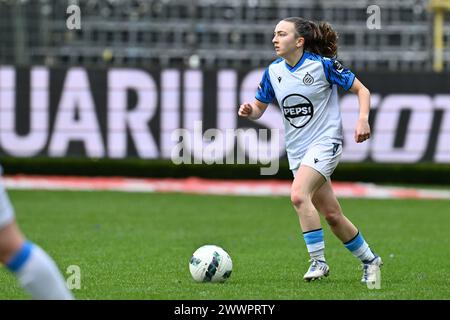 Angel Kerkhove (13) of Brugge pictured fighting for the ball with Luna Vanzeir (30) of ...