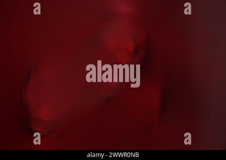 Silhouette of creepy ghost with skulls behind red cloth Stock Photo - Alamy