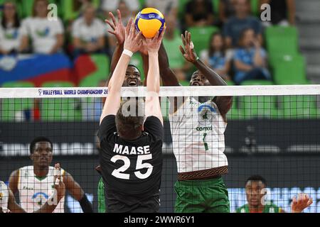Djakode Badawe (Cameroon), Lukas Masse (Germany). Volleyball World ...