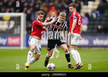 Notts County's Scott Robertson (left) and Cheltenham Town's Jonathan ...