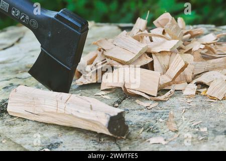 Thin dry chips are cut with an axe as kindling Stock Photo - Alamy