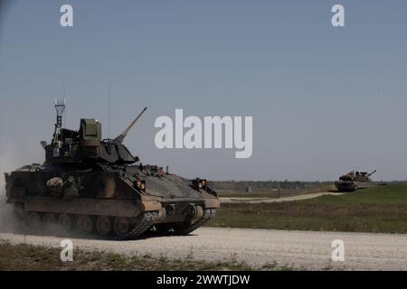 An Abrams Tank crew assigned to 3rd Battalion, 69th Armor Regiment, 1st ...