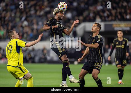 Nashville SC midfielder Alex Muyl (19) and Columbus Crew defender ...
