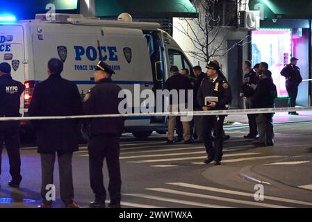 Police close off roads and sidewalks at the scene of a fatal New York City Police Officer ...