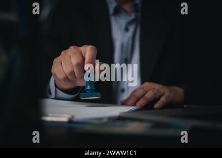 Hand man stamping documents notary public in office . Businessperson ...