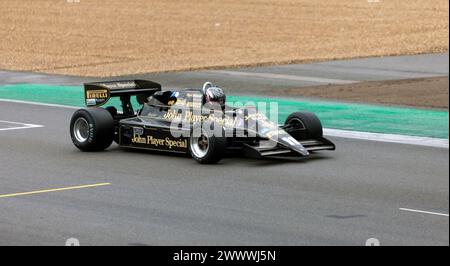 Michael Lyons driving his Black and Gold, 1983, Lotus 92, during the ...