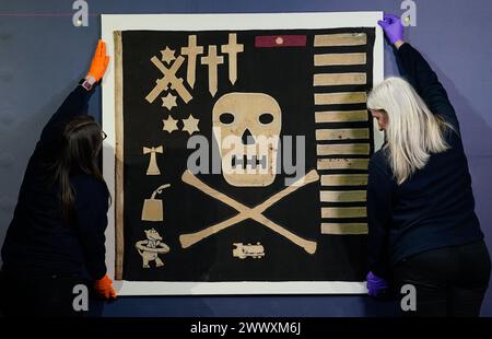 A Jolly Roger from HMS Unruffled, flown during the Second World War, is ...