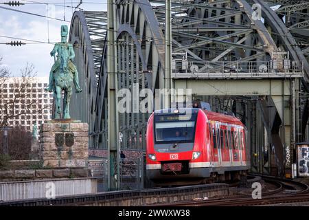 Deutsche Bahn local train coming from Hohenzollern bridge in the ...