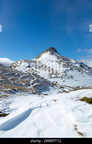 Looking towards the rocky summit of Meall Garbh along the Tarmachan ...