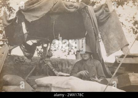 World War I photos: Soldier posted at a machine gun position in a ...