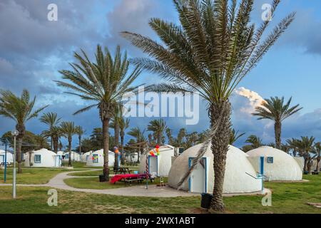beautiful guest houses in the form of a hemisphere on the Hof Dor beach ...