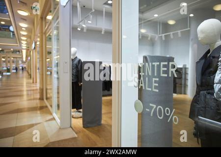 Background image of glass storefront displays in shopping mall at ...