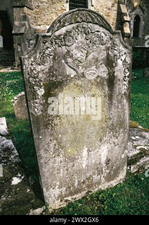 Eroded gravestone with floral design. Church of Saint Cuthbert ...