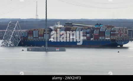 The fallen Francis Scott Key Bridge in Baltimore is pictured Sunday ...