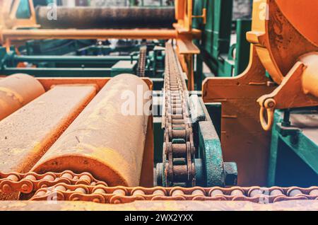 Front view old chain transmission mechanism. Rusty bearings, cardan ...