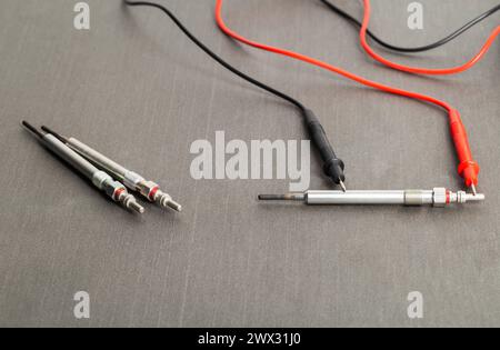 Checking the serviceability of the glow plug with a multimeter. Glow ...
